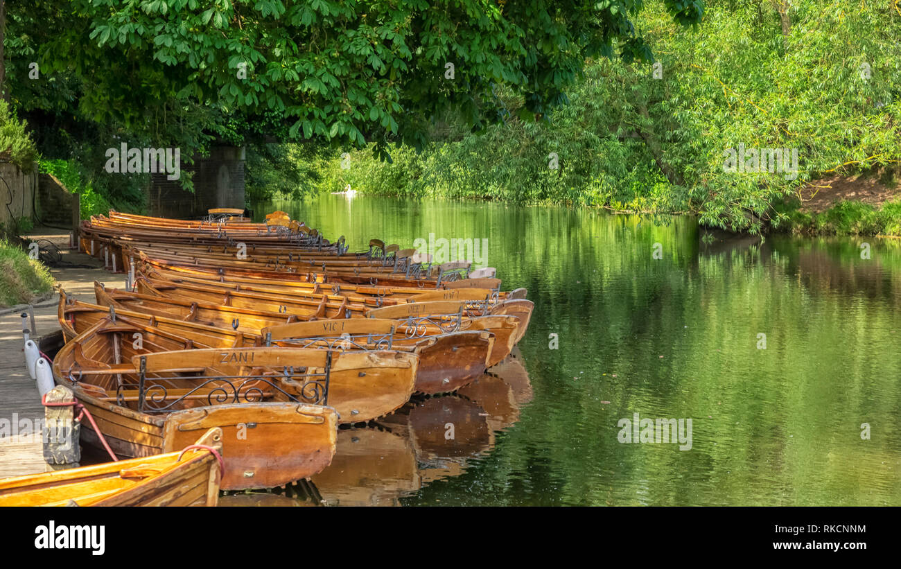 DEDHAM, ESSEX, UK - JUNE 13, 2018: Rowing Boats tied up on the banks of ...