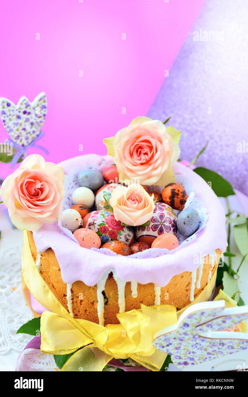 Easter cake with glace icing and easter eggs Stock Photo - Alamy