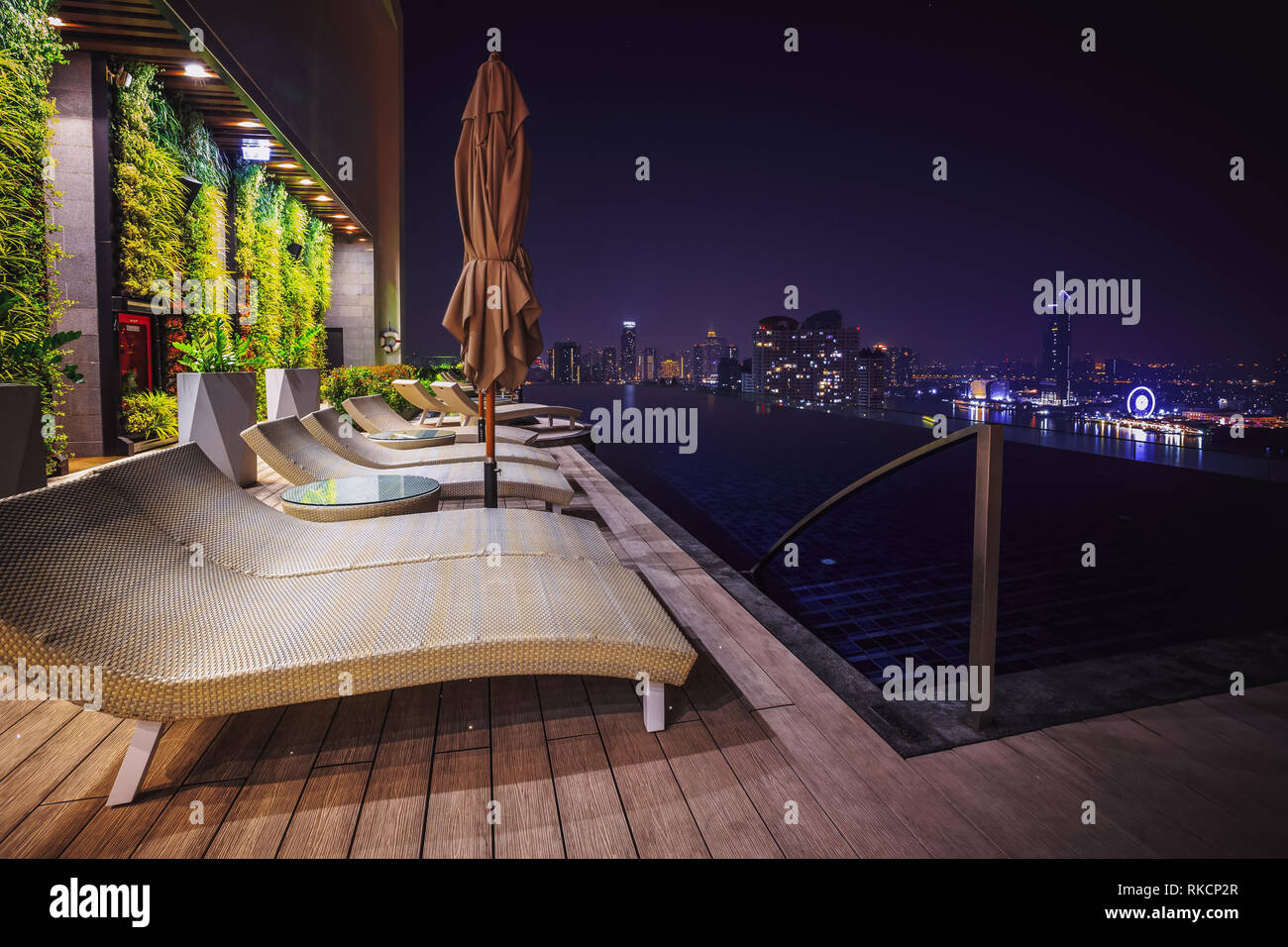 Beach Lounge Chairs Next to Pool Luxurious Hotel Scene Night Skyline ...
