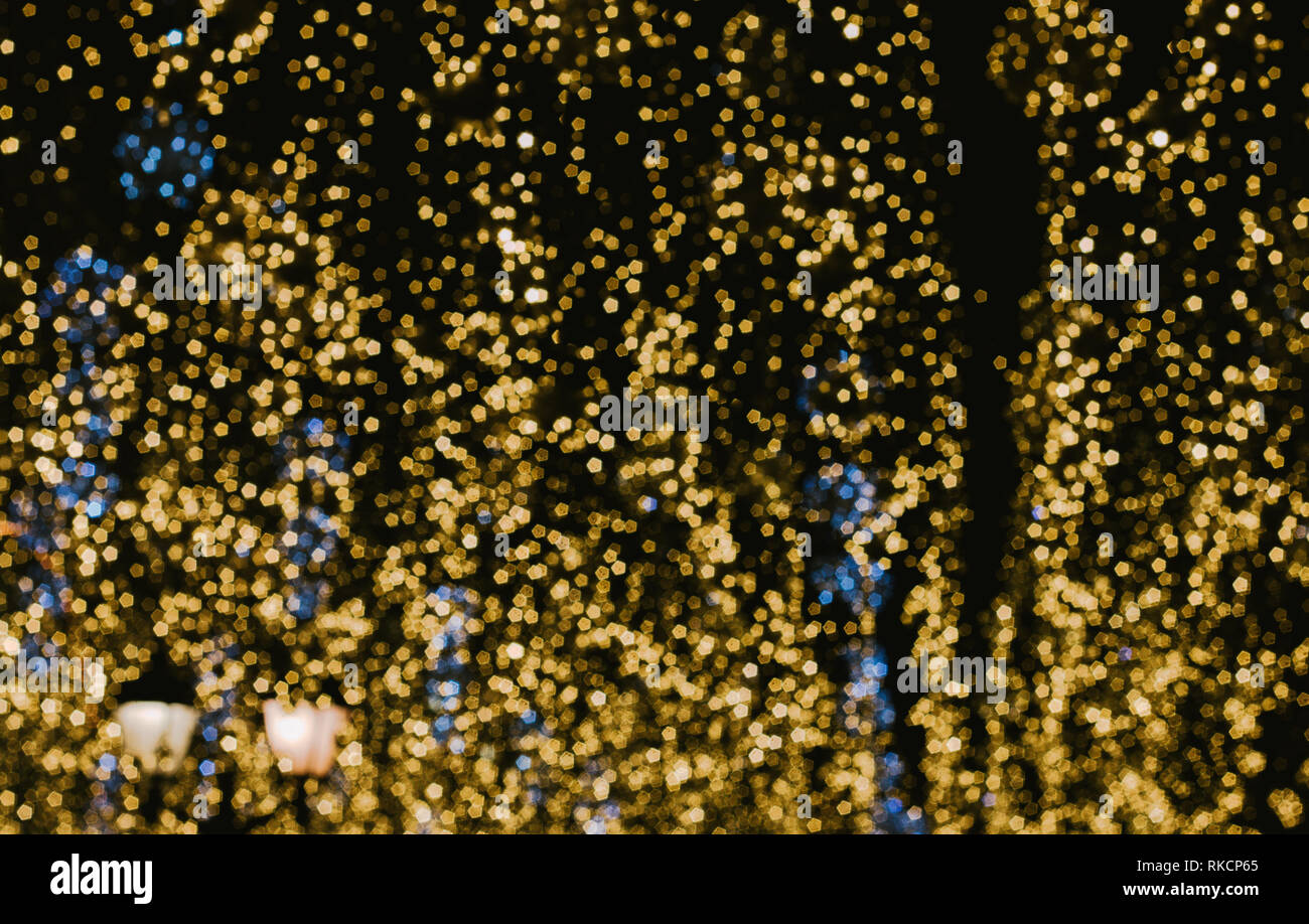 light abstract background of glowing bokeh holiday background unfocused ...