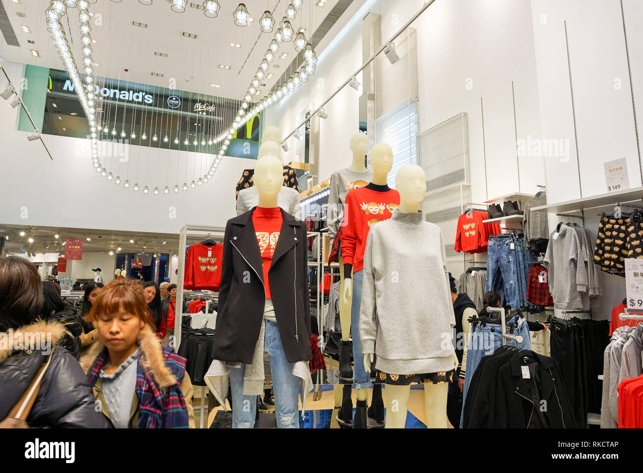 Fast fashion clothing for men women teenagers and children hi-res stock ...