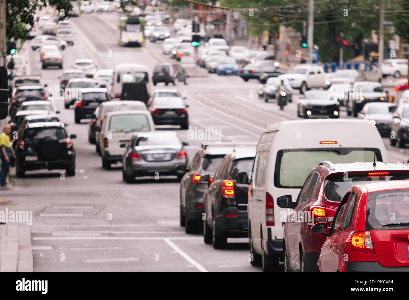 Heavy traffic cars on city street Stock Photo - Alamy