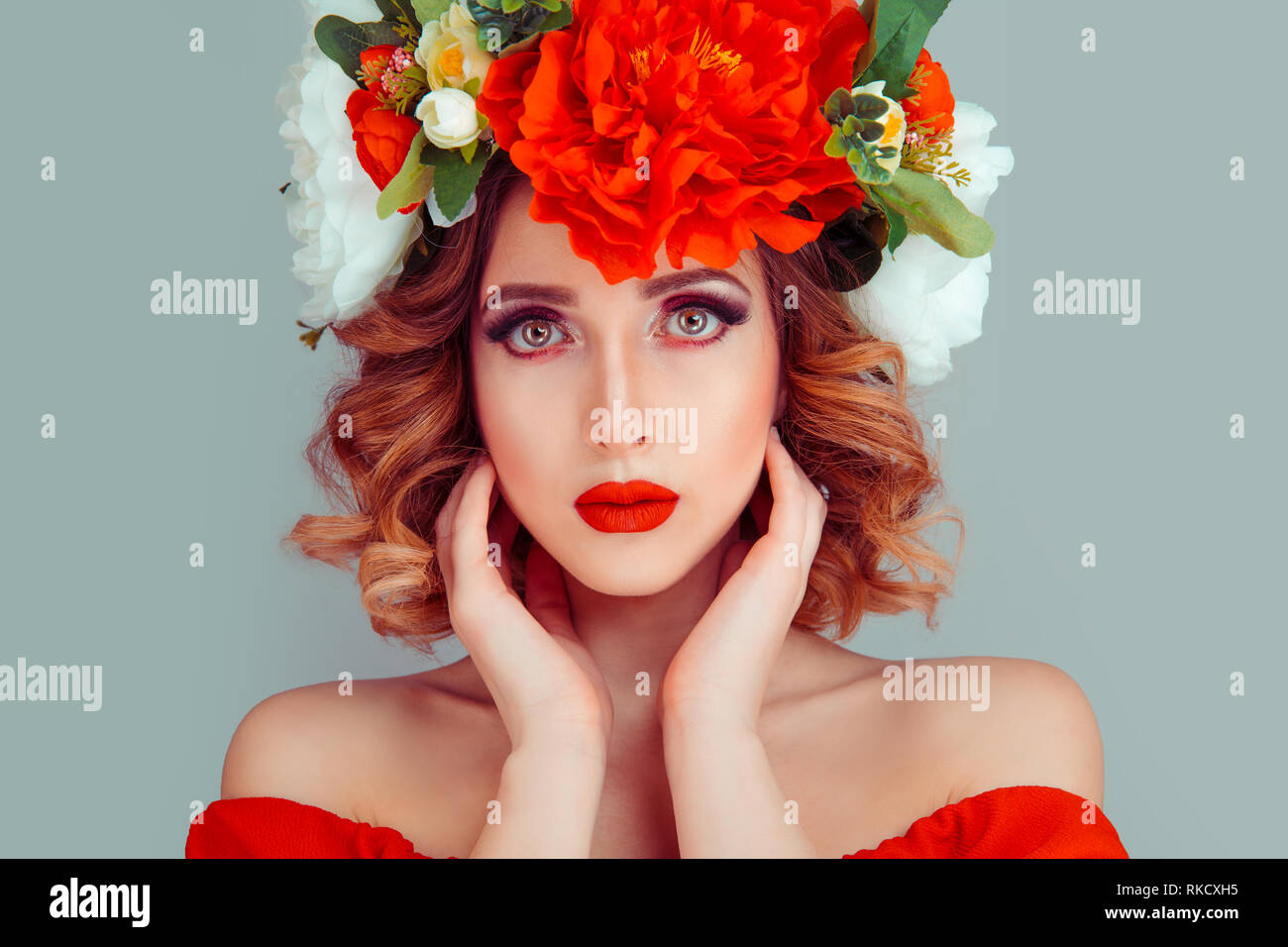 Beautiful young woman wearing floral headband Stock Photo - Alamy