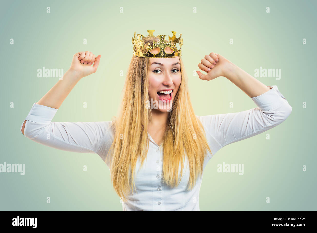 Confident woman wearing crown Stock Photo - Alamy