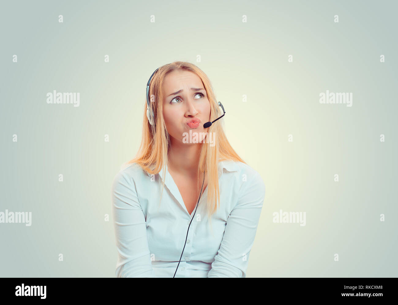 Woman with headset sad hi-res stock photography and images - Alamy