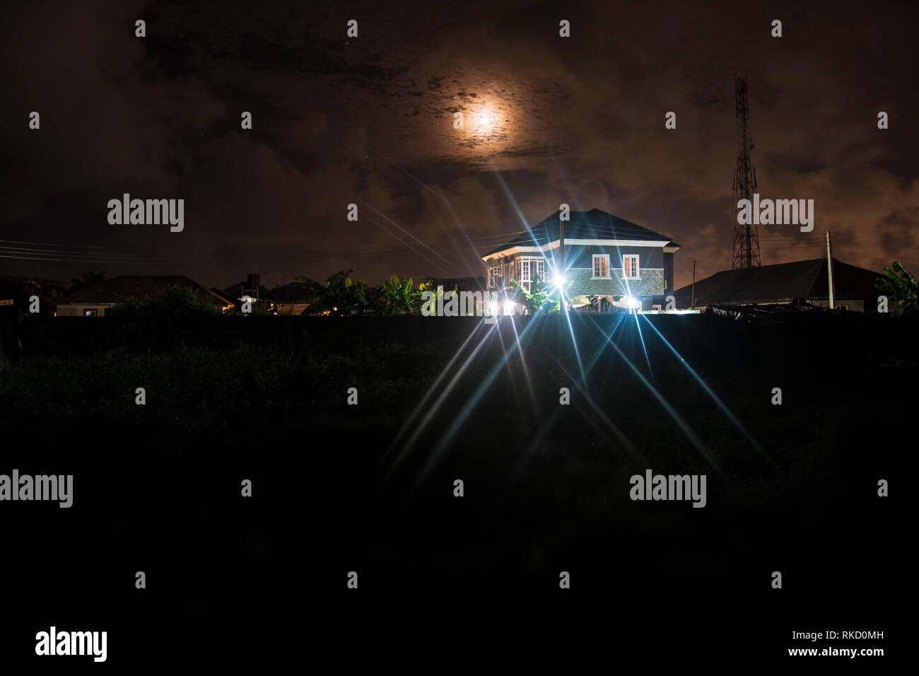 House in the Night Stock Photo - Alamy