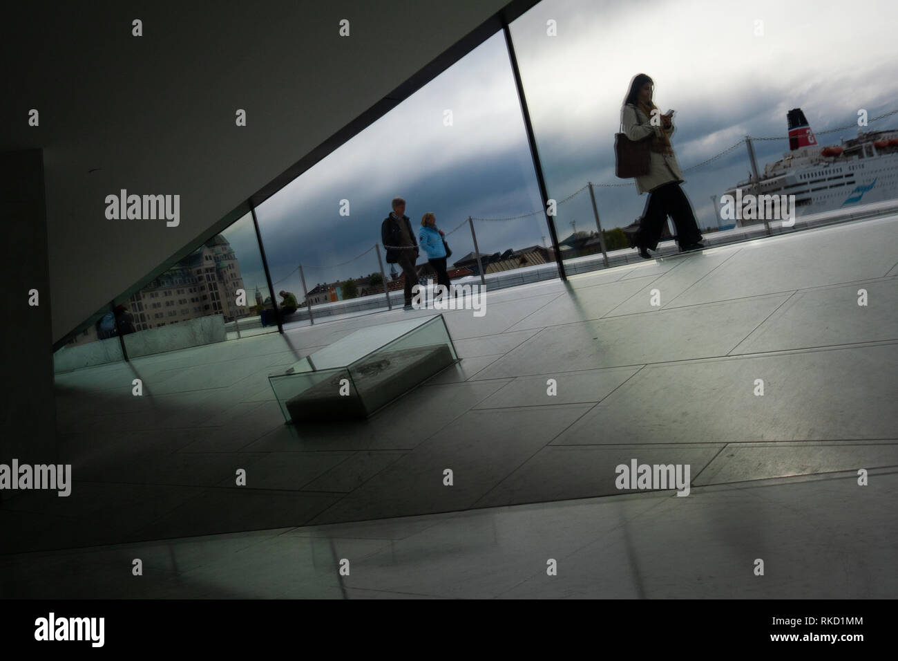 People walking by outside the opera house in Oslo, Norway Stock Photo ...