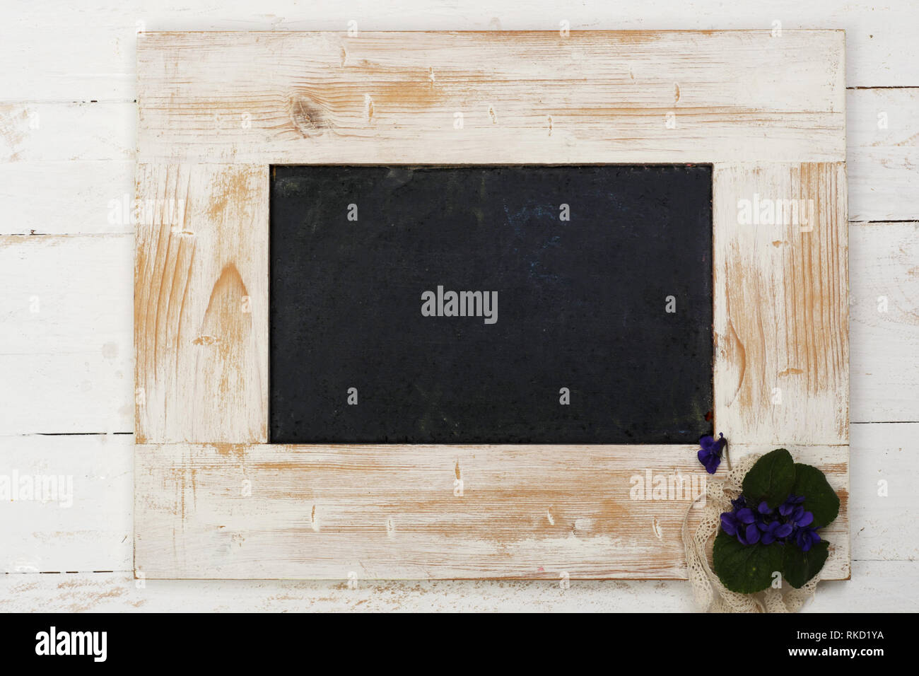 school slate with a white painted wooden frame Stock Photo - Alamy