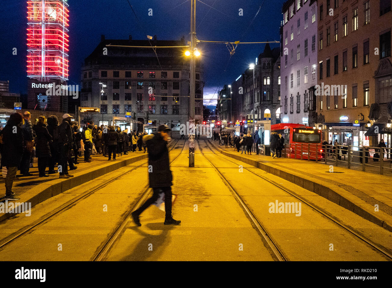 Man crossing the street from Jernbanetorget to Europarådets plass in ...