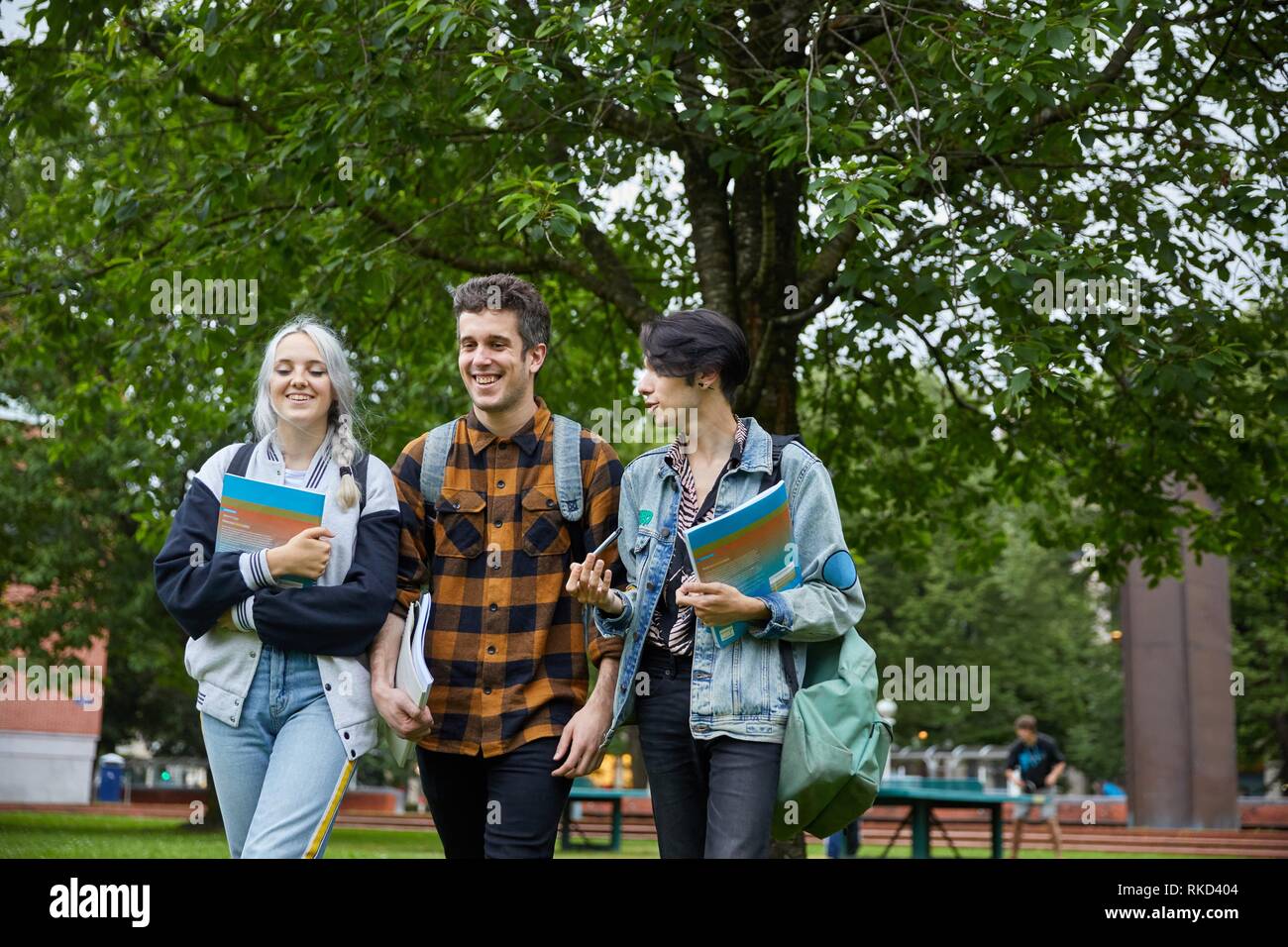 Three students walking university hi-res stock photography and images ...