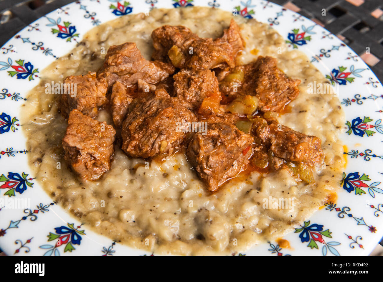 Plate of Turkish dish hunkar begendi (Turkish braised lamb and eggplant ...