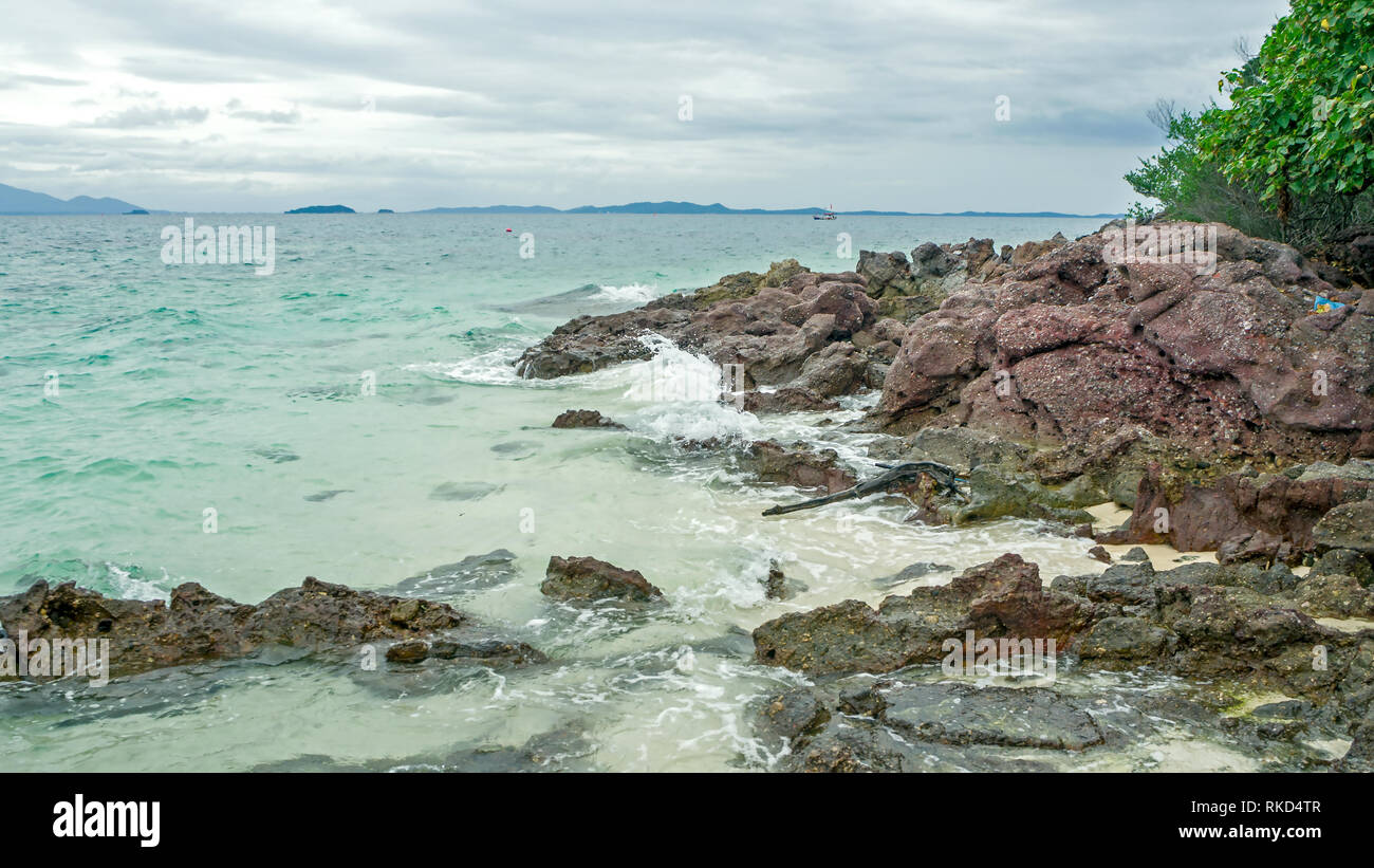 Rocks and ocean at beach in Thailand, Koh Thalo Tropical island ...