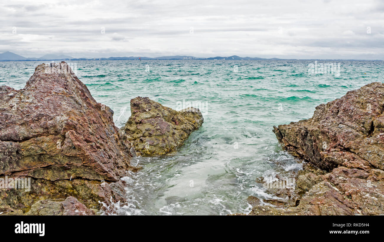 Rocks and ocean at beach in Thailand, Koh Thalo Tropical island ...