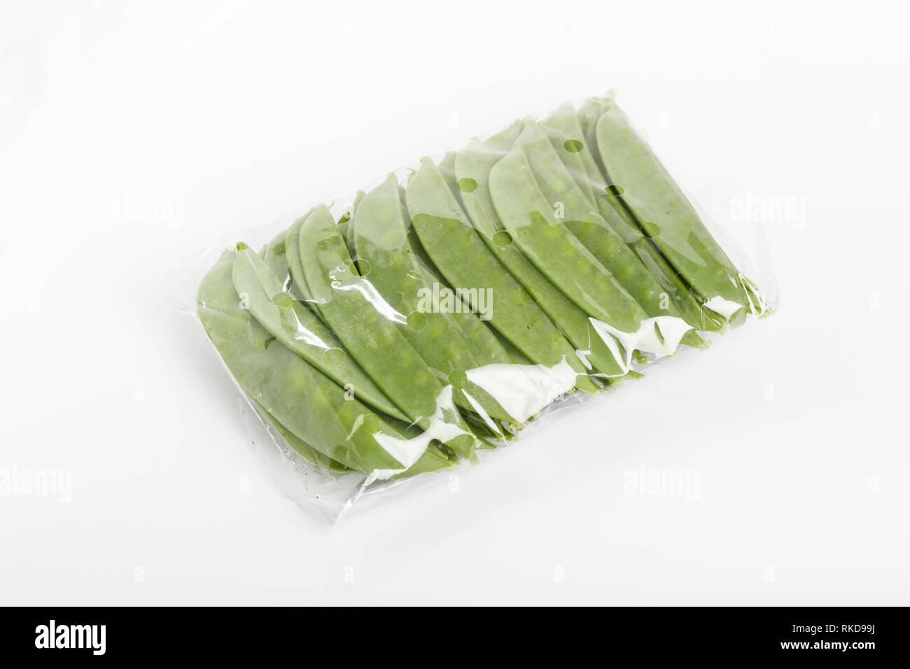 Fresh snow peas isolated on white background Stock Photo - Alamy