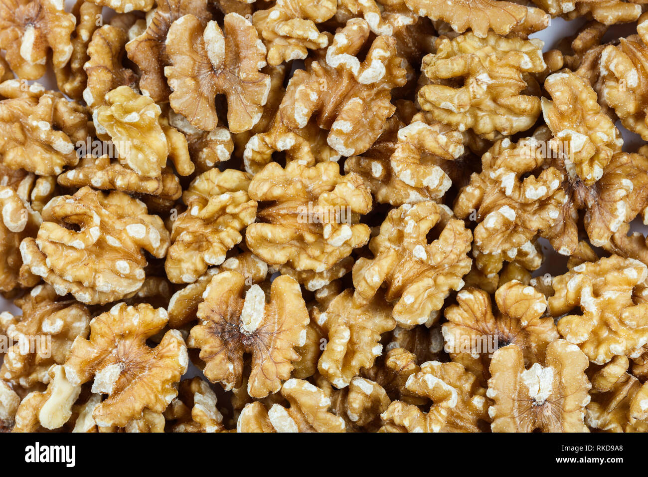 yellow cooked walnut, food background, close up Stock Photo - Alamy