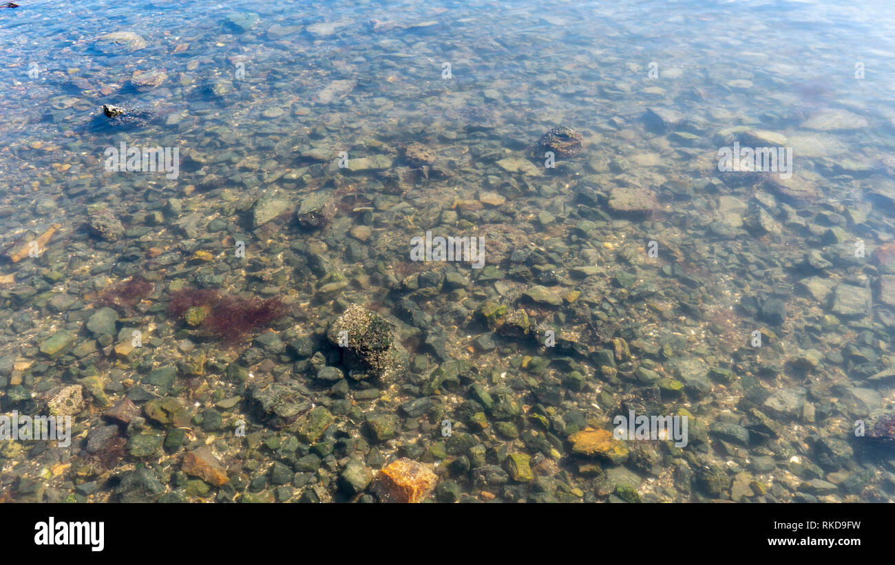 Rocks Just Under the Surface Stock Photo - Alamy
