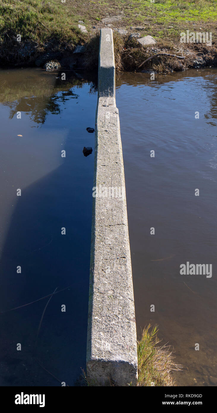 Concrete Divider in Water Stock Photo - Alamy