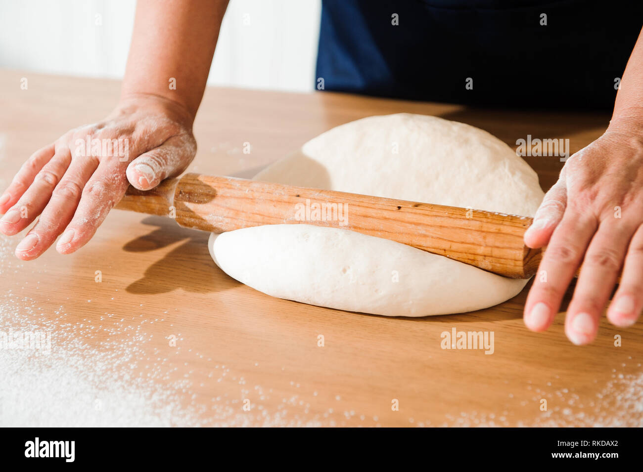 Chef preparing dough - cooking process, work with flour Stock Photo - Alamy