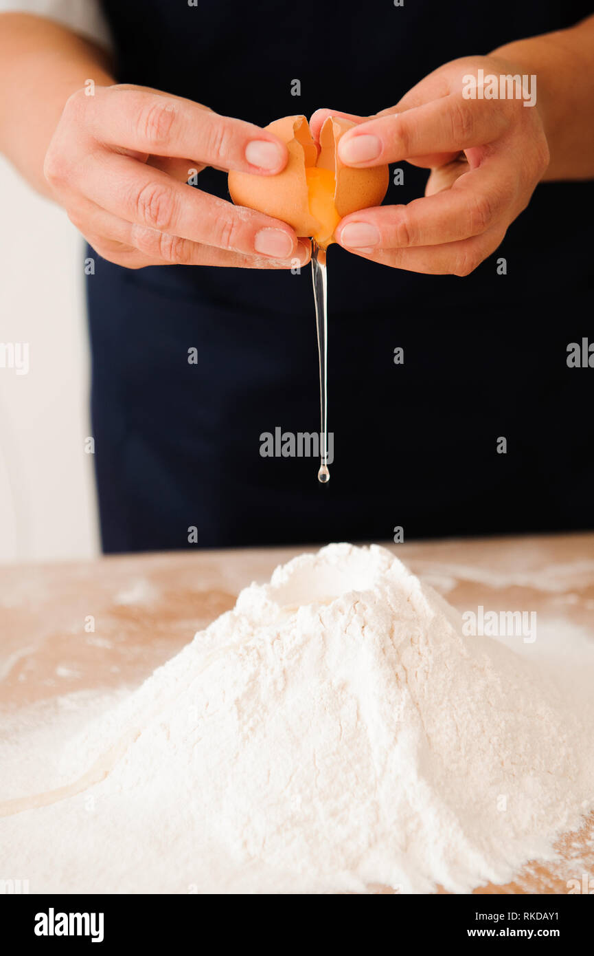 Chef preparing dough - cooking process, work with flour Stock Photo - Alamy
