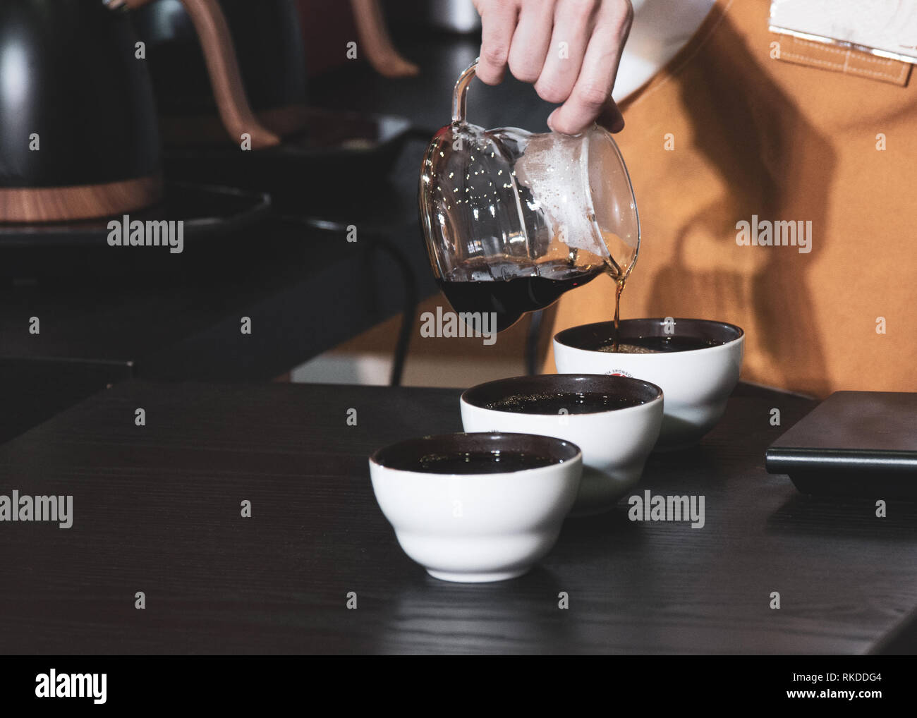 Tasting Coffee, Coffee tasting glasses in a coffee shop Stock Photo - Alamy