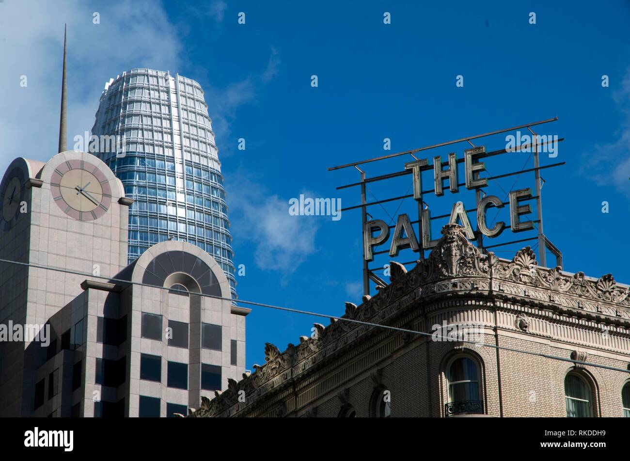 The Salesforce Tower can be seen behind the neon sign of The Palace ...