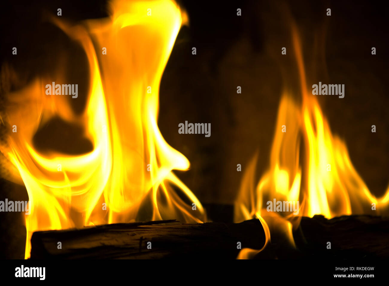 A close up view of flames rising in the dark sky from a camp fire Stock ...
