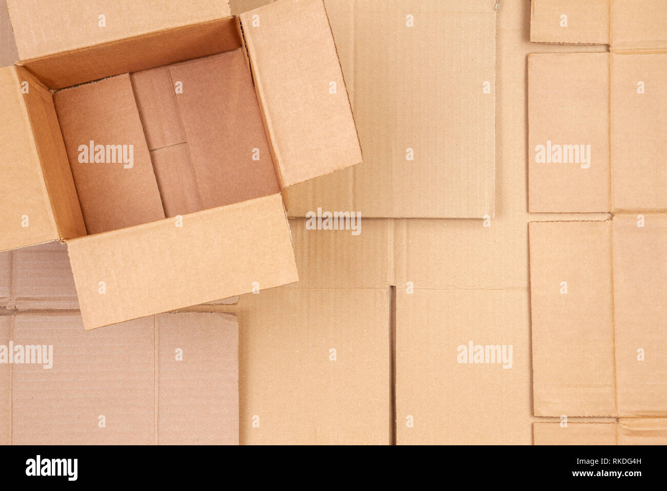 Open cardboard box on used corrugated striped cardboard boxes parts ...