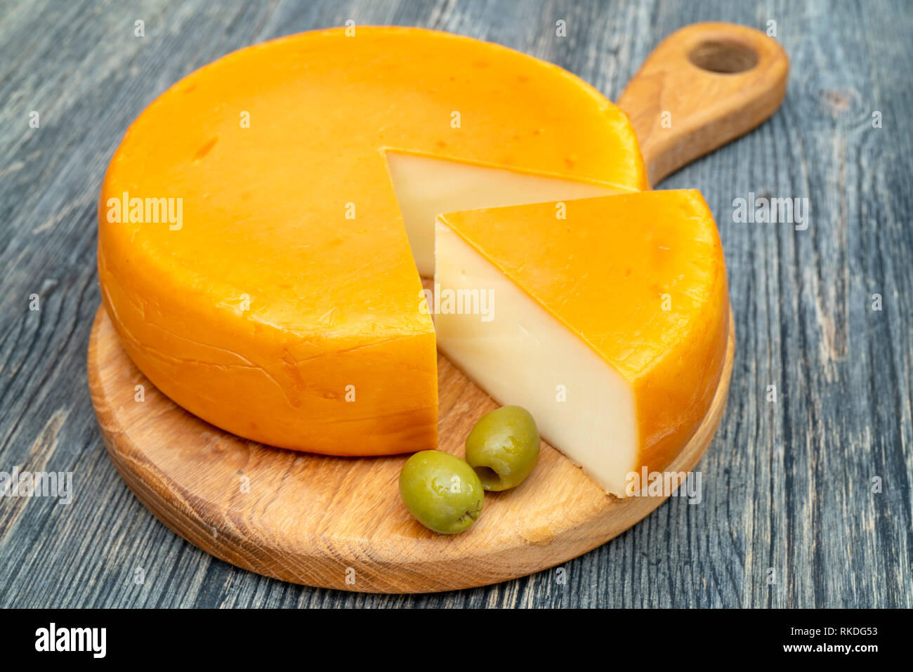 Fresh, round cheese Stock Photo - Alamy