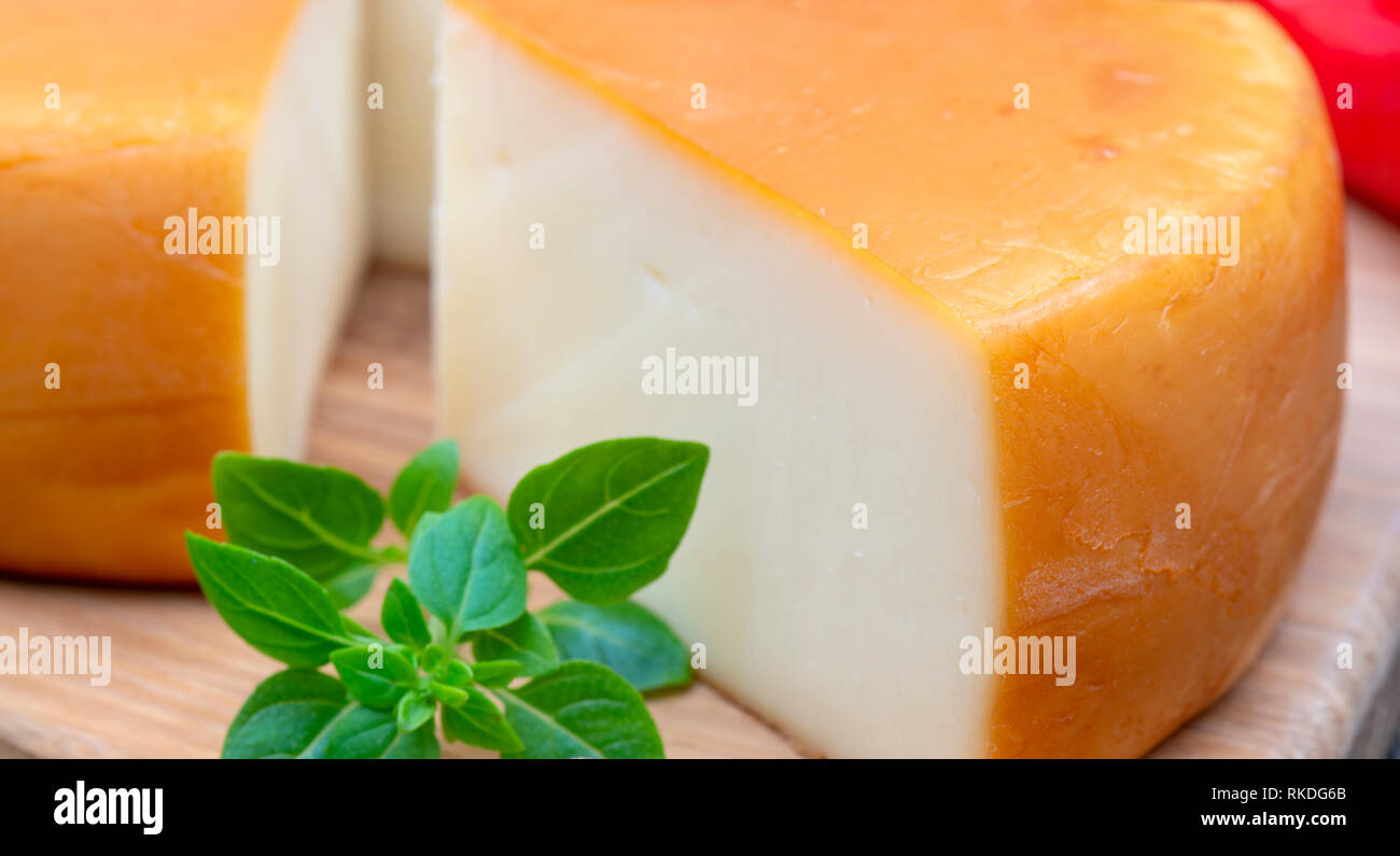 Fresh, round cheese Stock Photo - Alamy