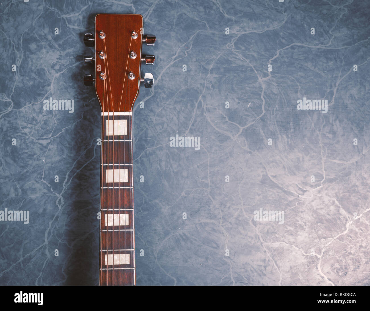 acoustic guitar neck on blue marble background,music concept Stock ...