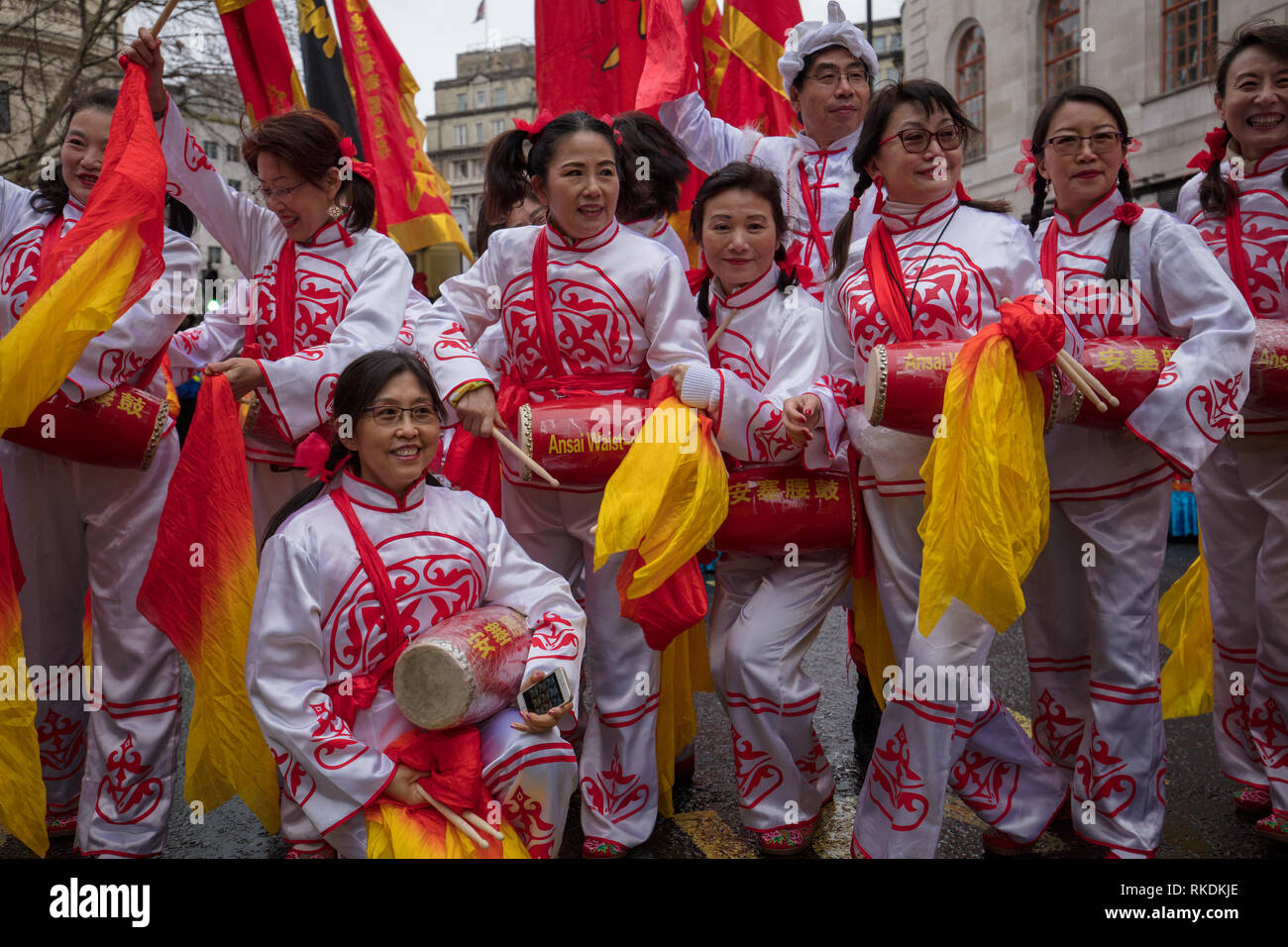Chinese all female dance group in colourful traditional clothing and ...