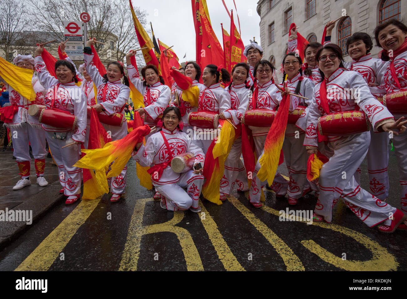 Chinese all female dance group in colourful traditional clothing and ...