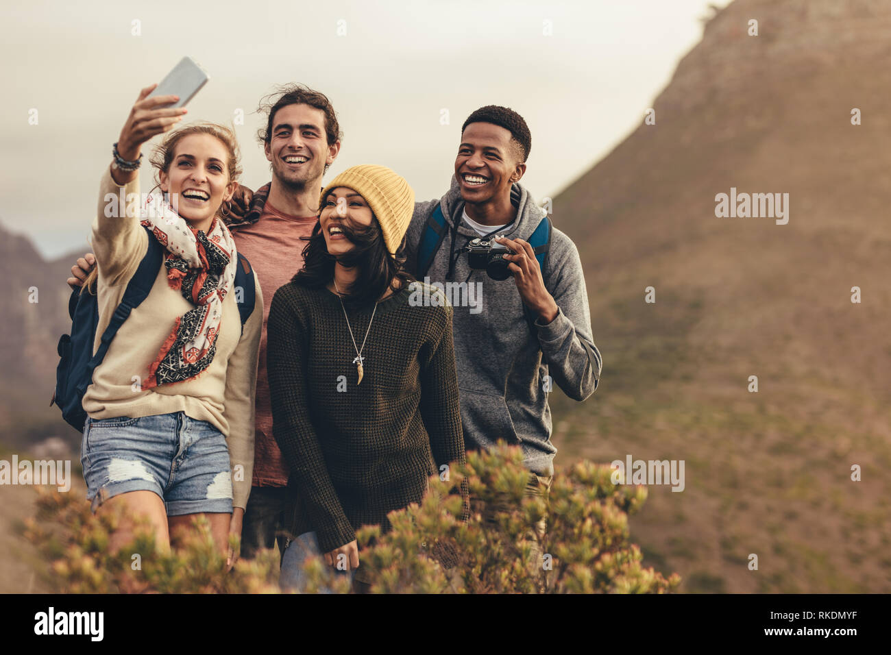 Group of social networking friends on hiking trip. Group of creatives ...