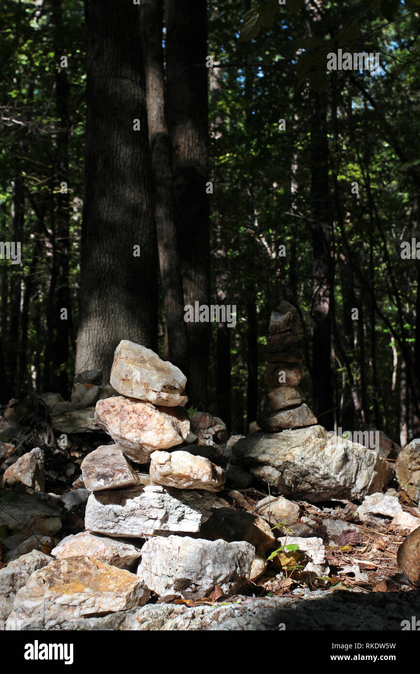 Two cairns built out of large rocks on the Sal's Branch Trail in ...