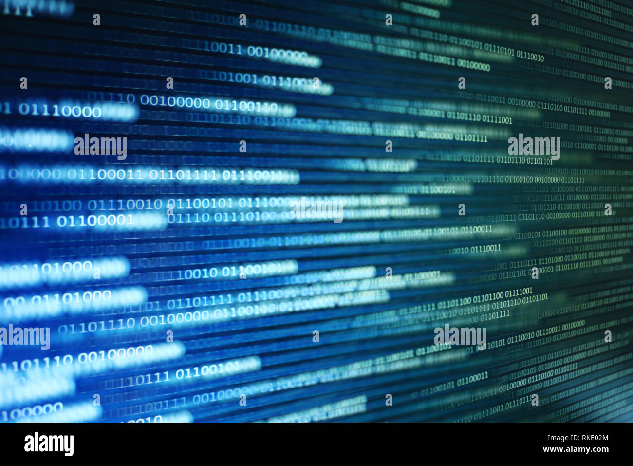 binary data on computer monitor. multiple layers of codes streaming ...