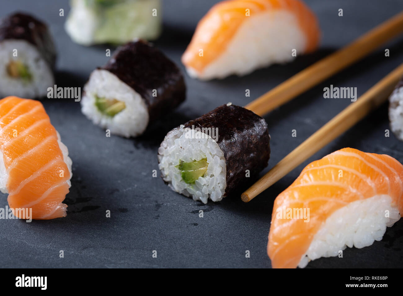 Fresh seafood sushi meal on darck background Stock Photo - Alamy