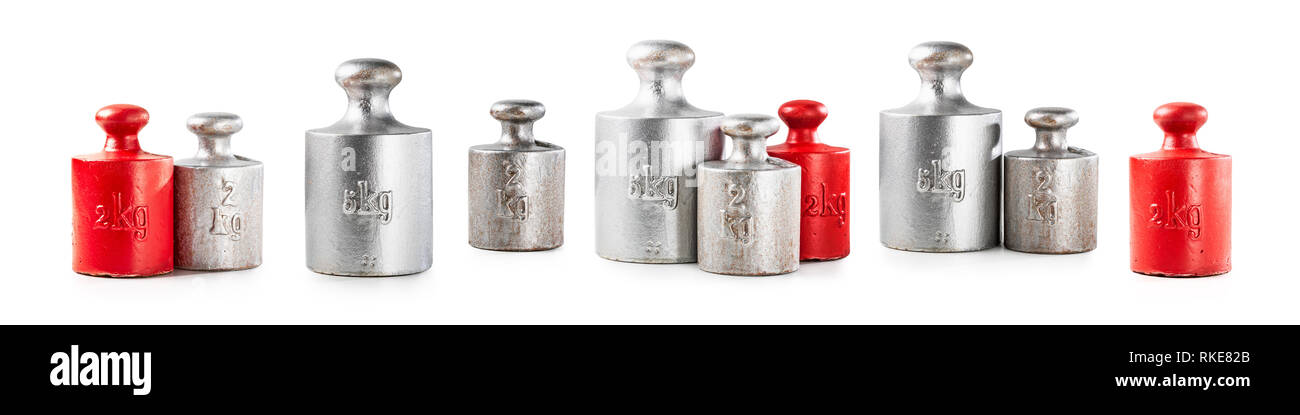 Old weights silver and red colored collection isolated on white ...
