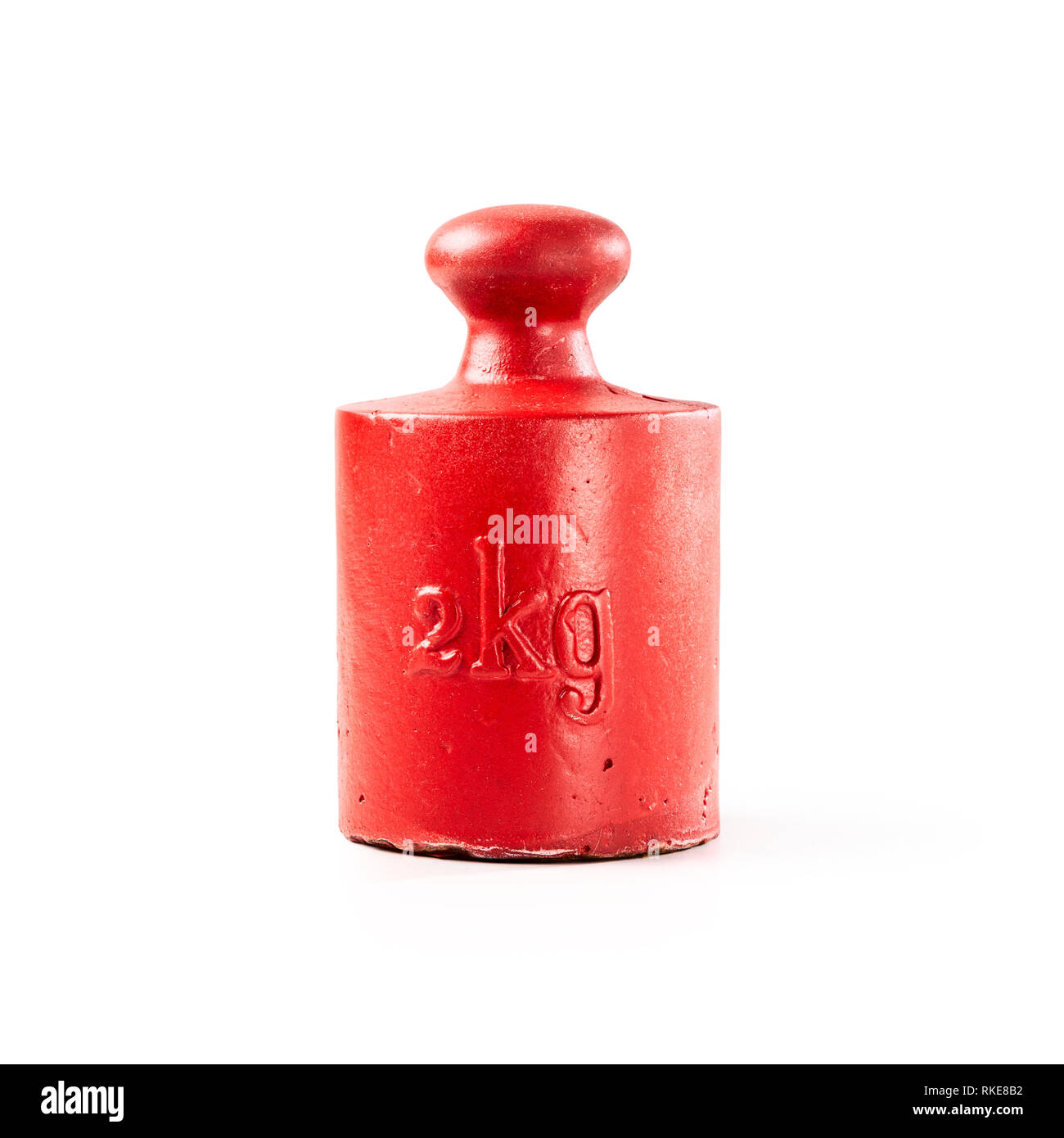 Old weight red colored isolated on white background clipping path ...