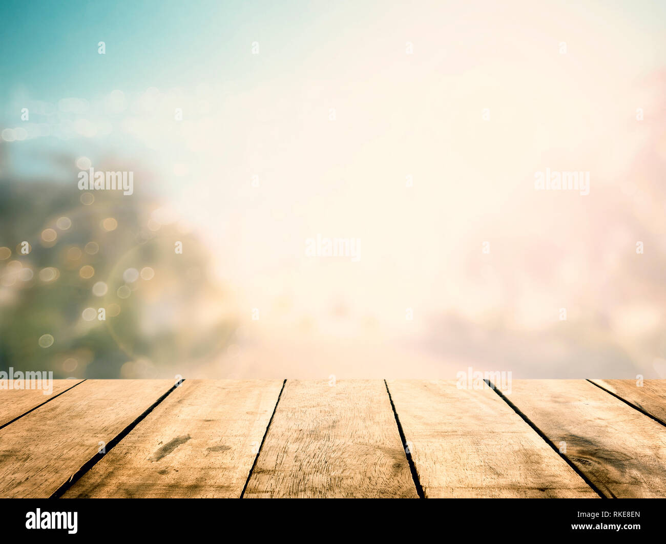 Wooden board table in front of blurred pattani public mosque background ...