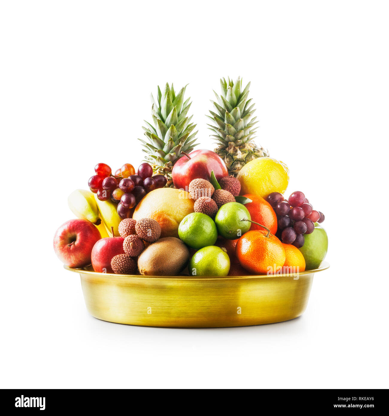Fresh fruits in golden bowl. Healthy eating and dieting concept. Winter ...