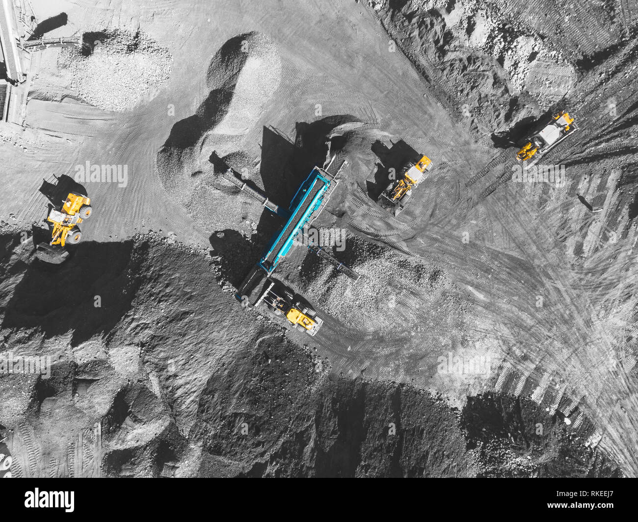 View from above, on the process of sorting coal mined. Open pit mine ...