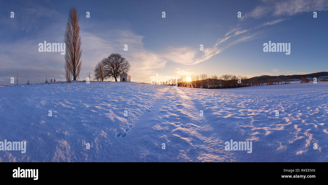 Winter field witn chapel - panorama rural landscape Stock Photo - Alamy