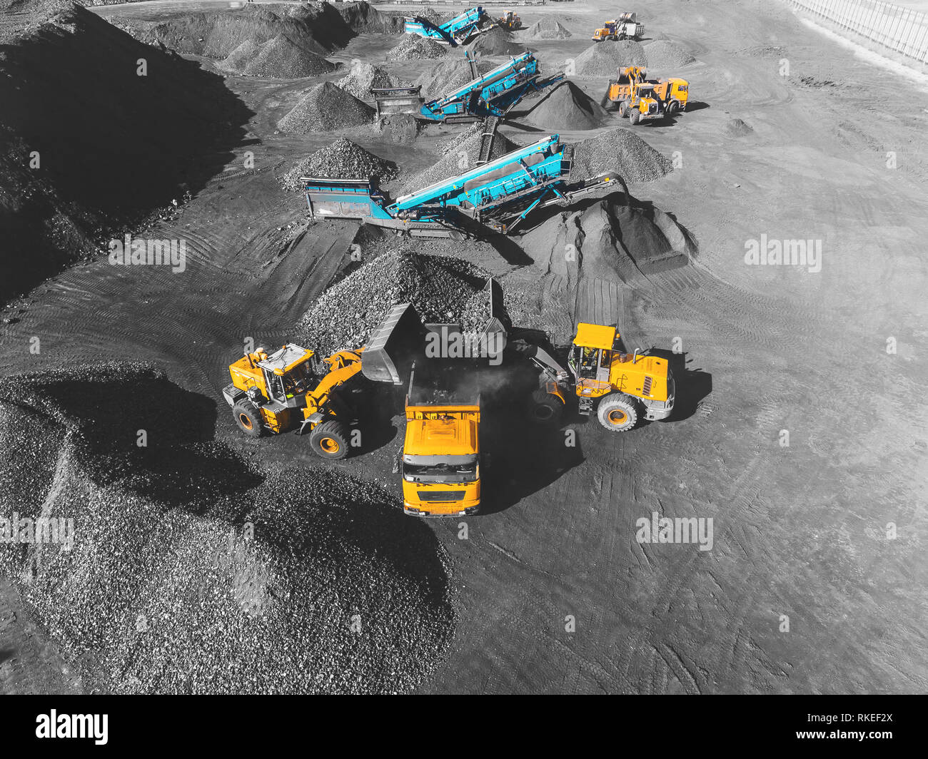 View from above, on the process of sorting coal mined. Open pit mine ...