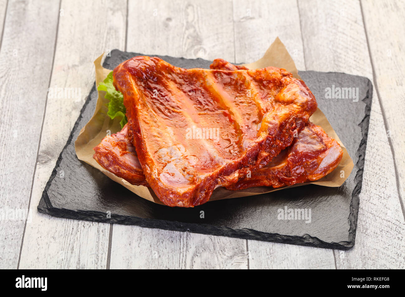 Raw marinated pork ribs ready for cooking Stock Photo - Alamy