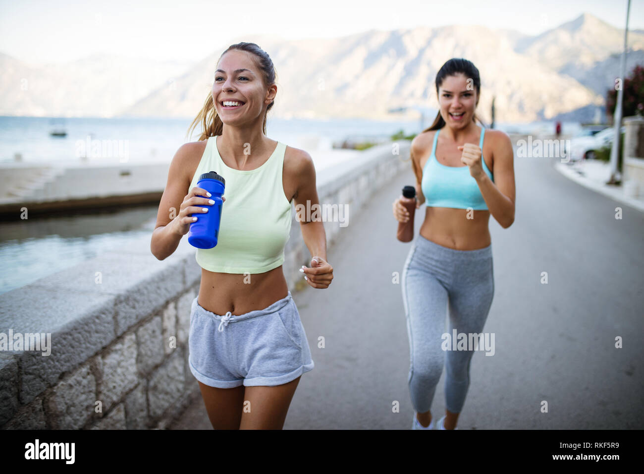 Group of young people jogging and running outdoors in nature Stock ...