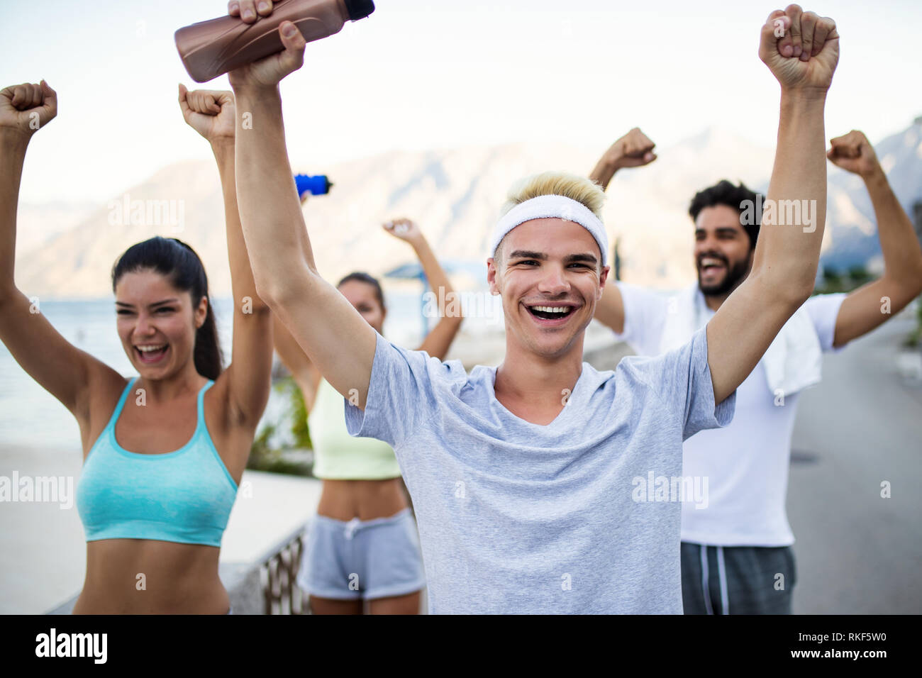 Friends fitness training together outdoors living active healthy Stock ...