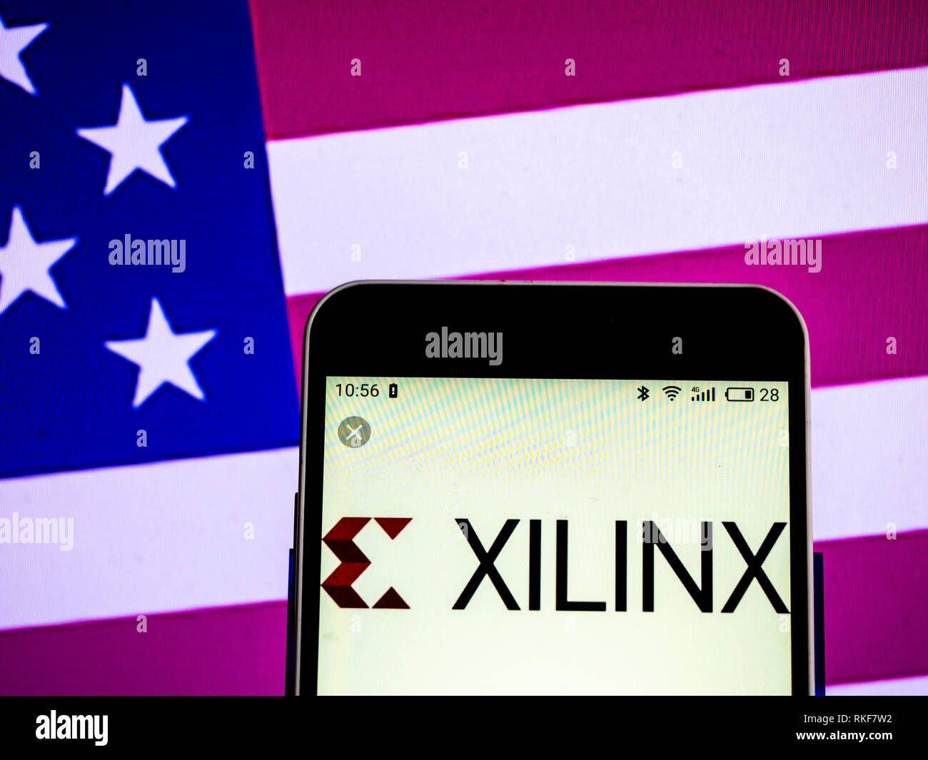 Xilinx Semiconductor manufacturing company logo seen displayed on smart ...