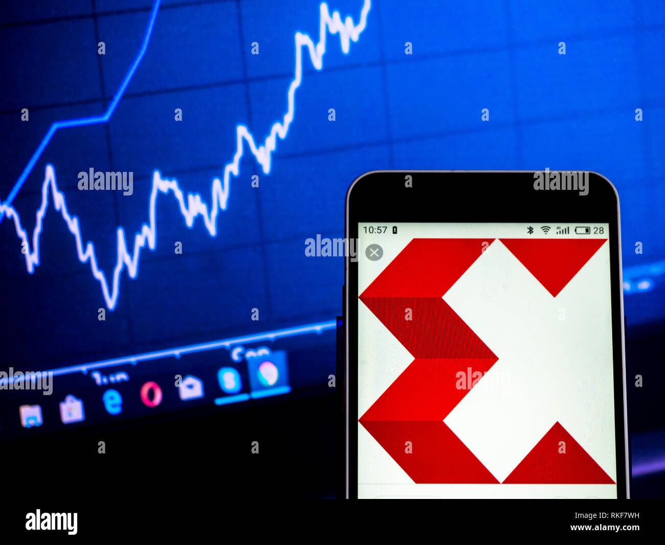 Xilinx Semiconductor manufacturing company logo seen displayed on smart ...