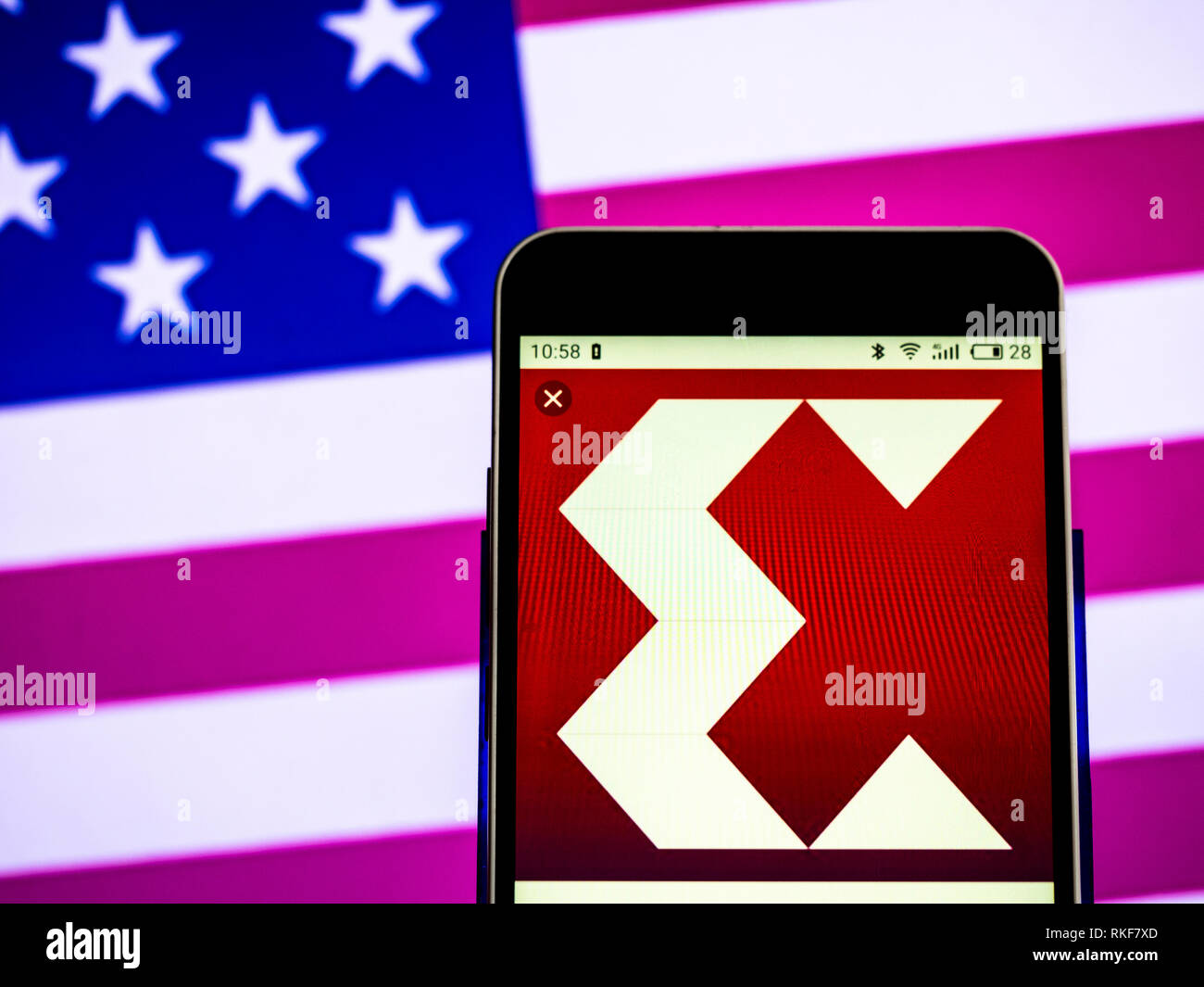 Xilinx Semiconductor manufacturing company logo seen displayed on smart ...