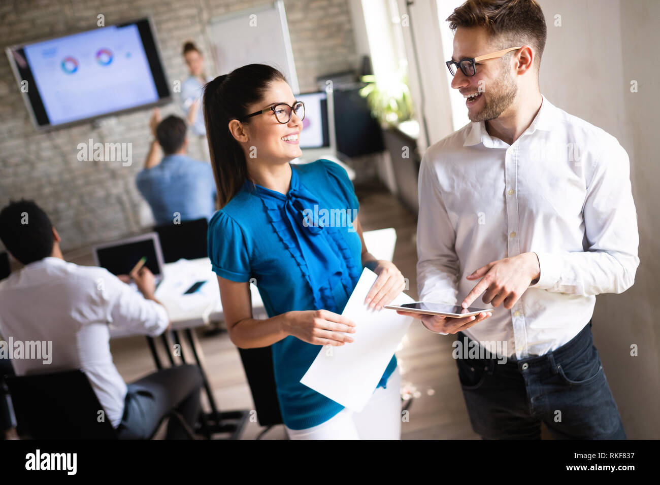 Happy creative team in office. Business, startup, design, people and ...